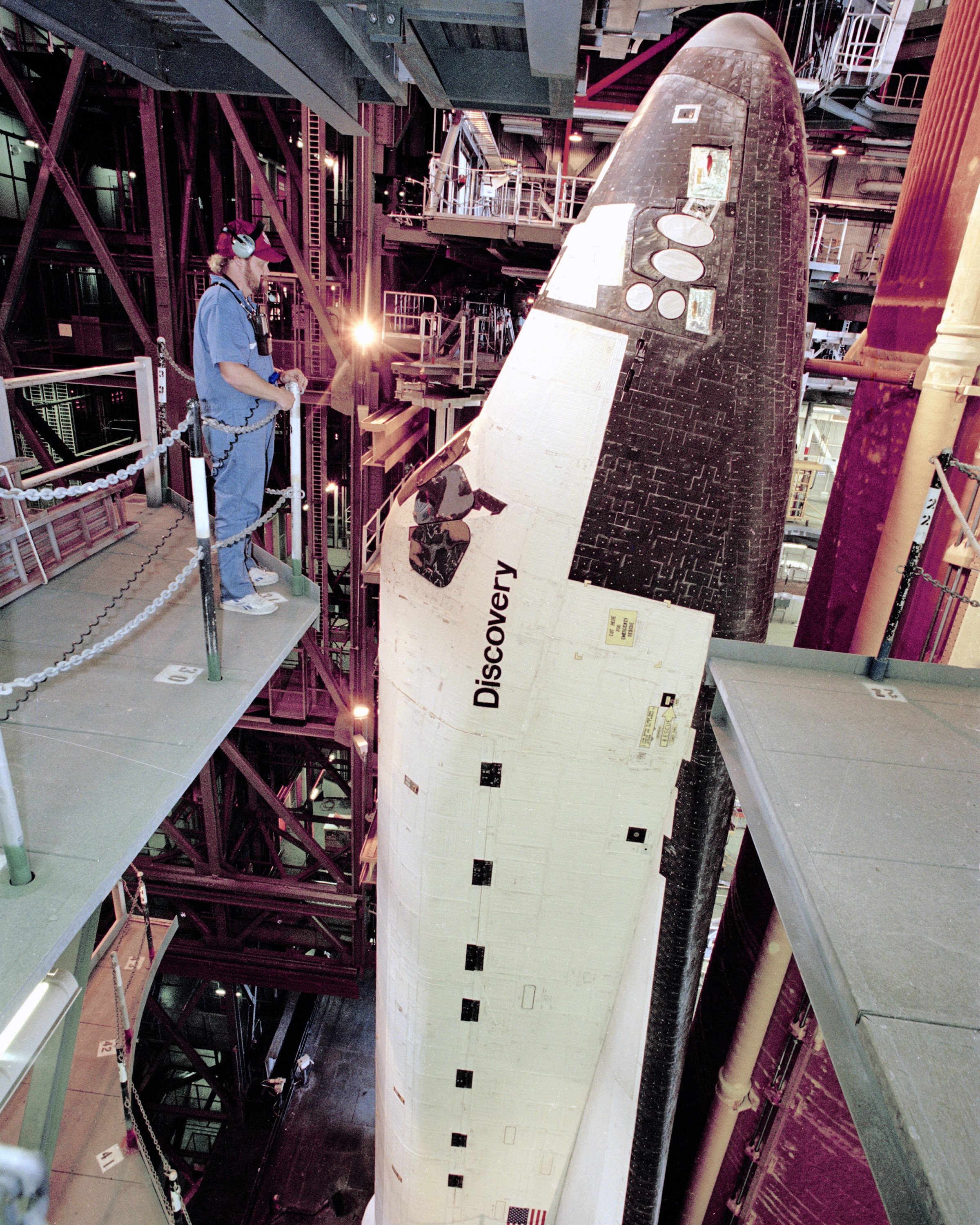 Space Shuttle Discovery heads out of the VAB to Launch Pad 39B, ahead ...