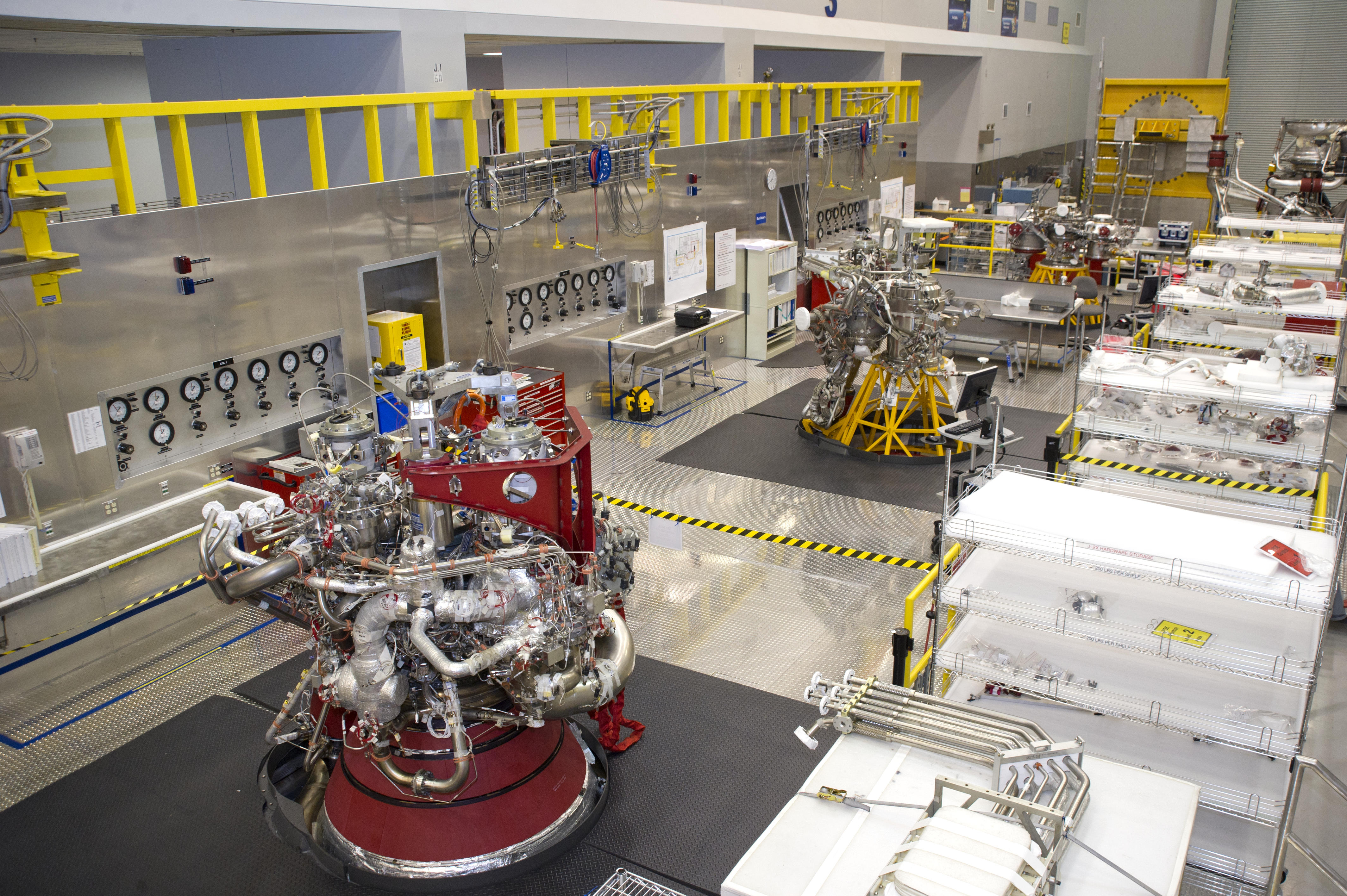 Two J-2X engines and a powerpack, developed for NASA by Pratt and ...