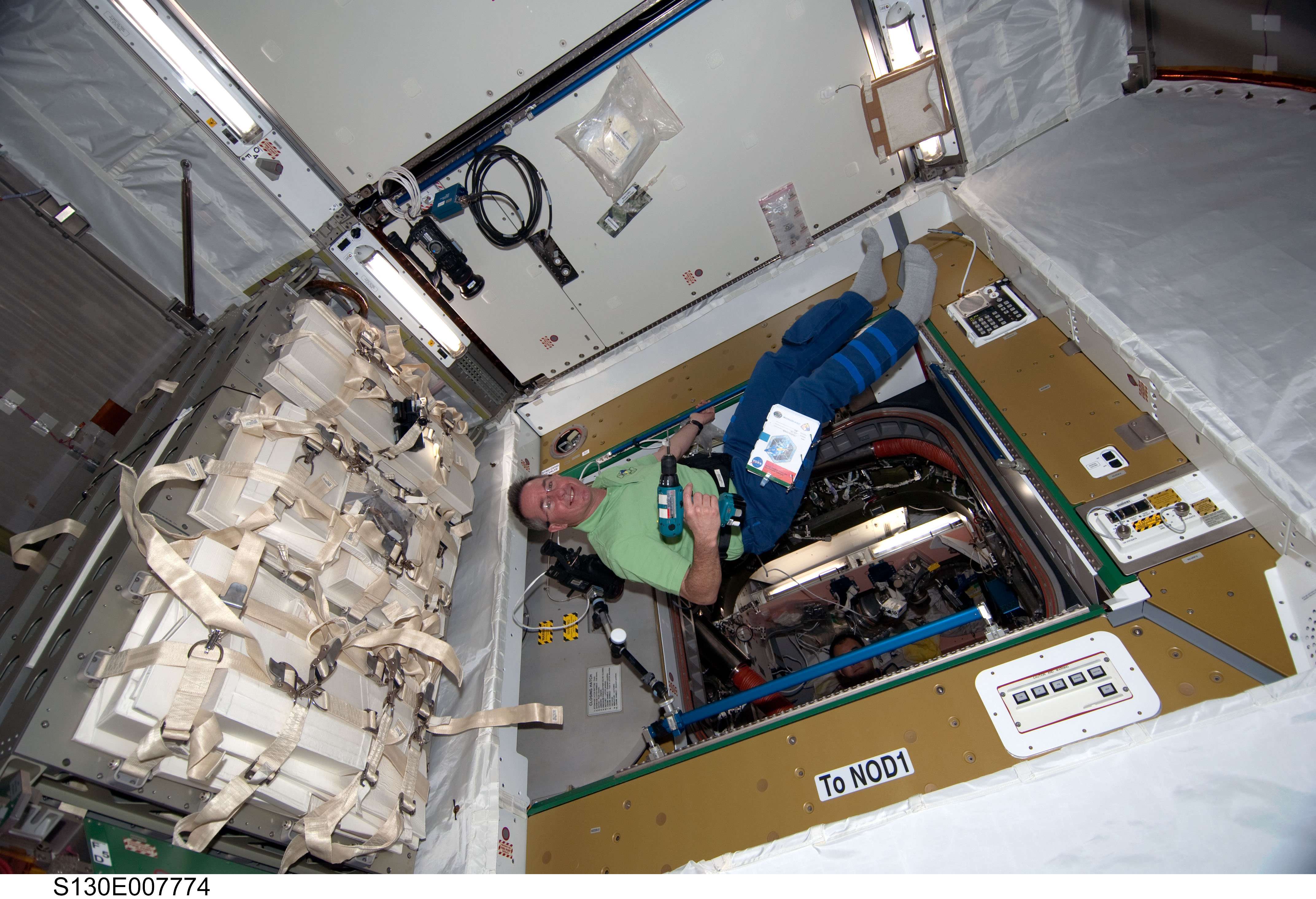 iss - What's the small white gadget with two black buttons in this ...